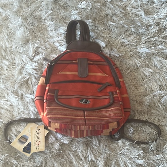 Multisac | Bags | Nwt Multisac Mini Backpack Crossbody Earthtone Orange ...